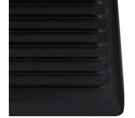 vidaXL Calzos para ruedas 4 piezas goma 16x9x9 cm | vidaXL.es